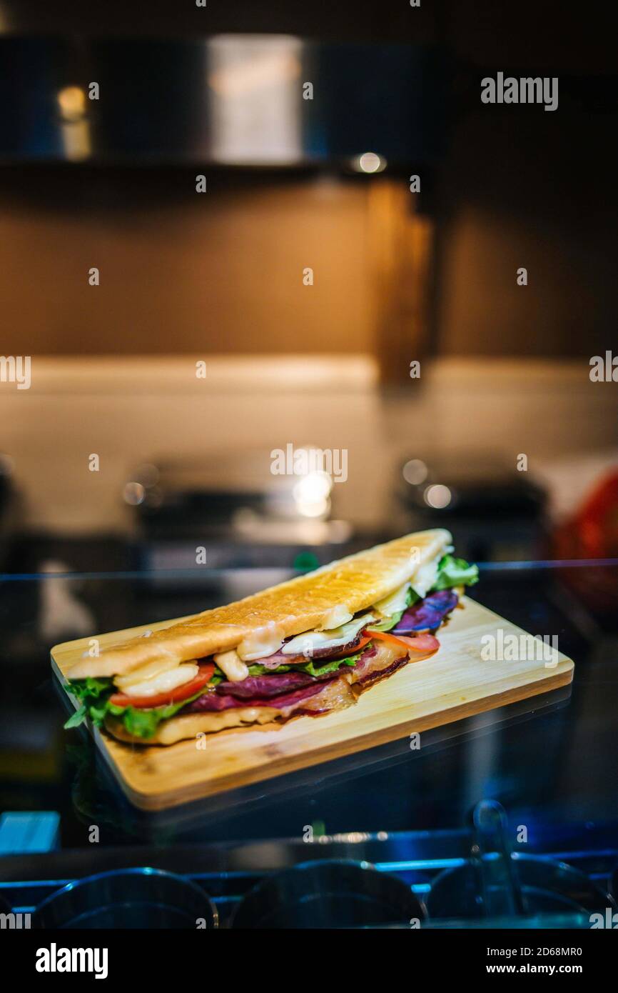 Vertical shot of a delicious sandwich on the table Stock Photo - Alamy