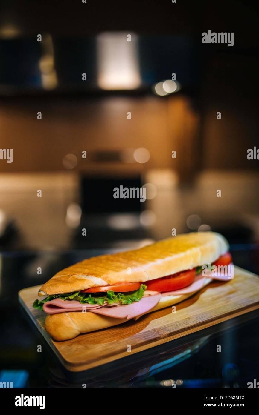 Vertical shot of a delicious sandwich on the table Stock Photo - Alamy