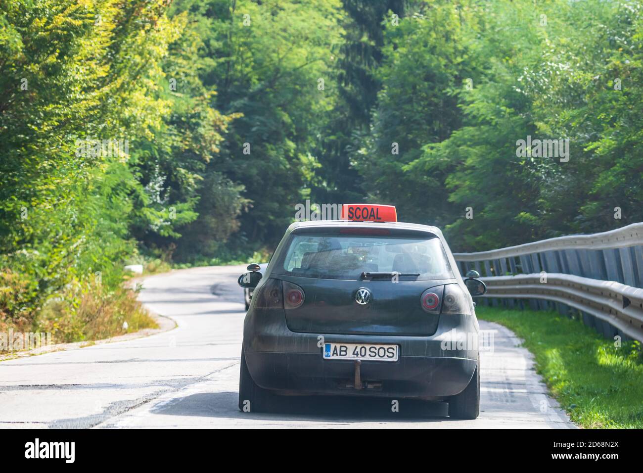 Romanian driving school car on road in Bihor, Romania, 2020 Stock Photo ...