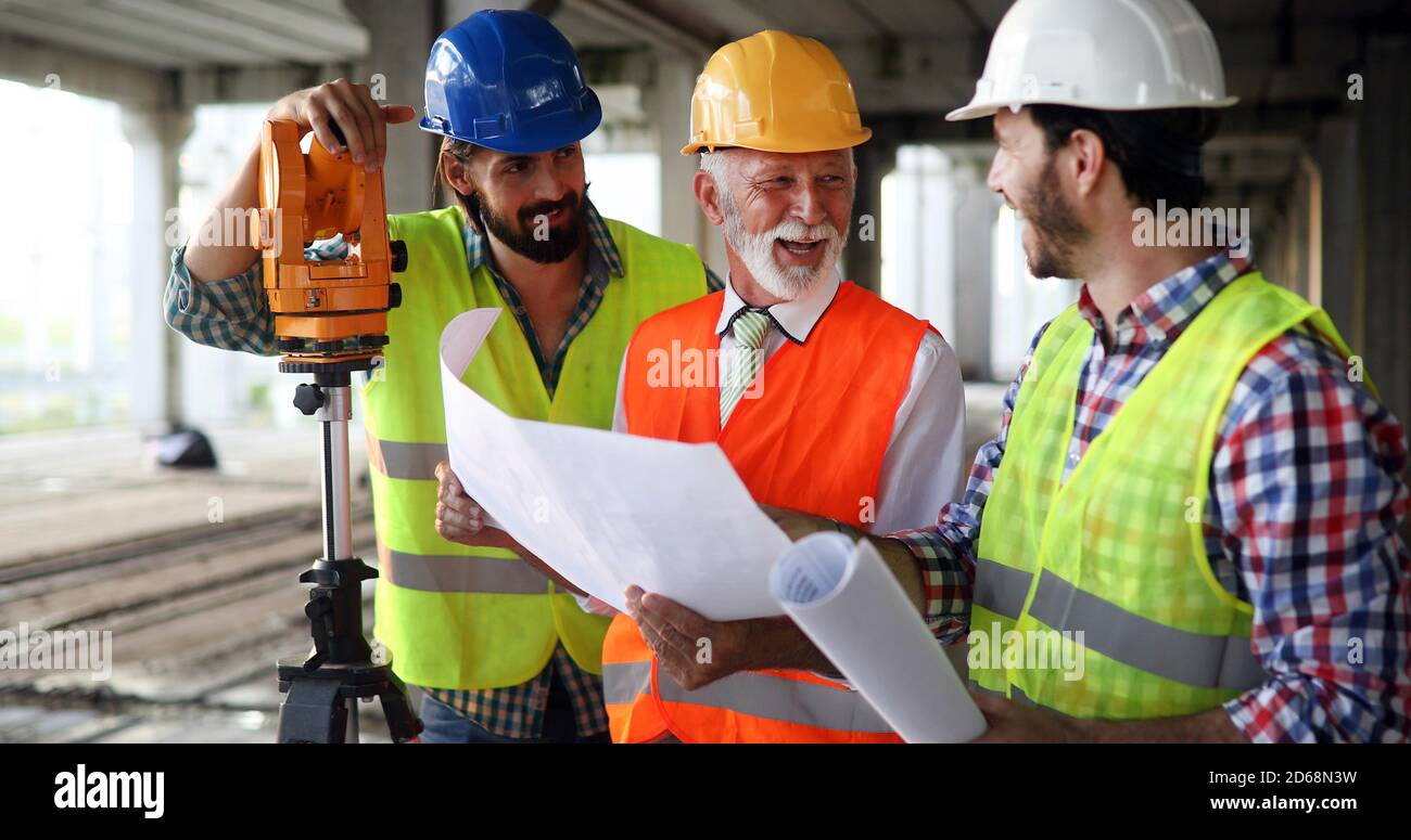 Engineer, contractor, architect teamwork. Construction people talking ...