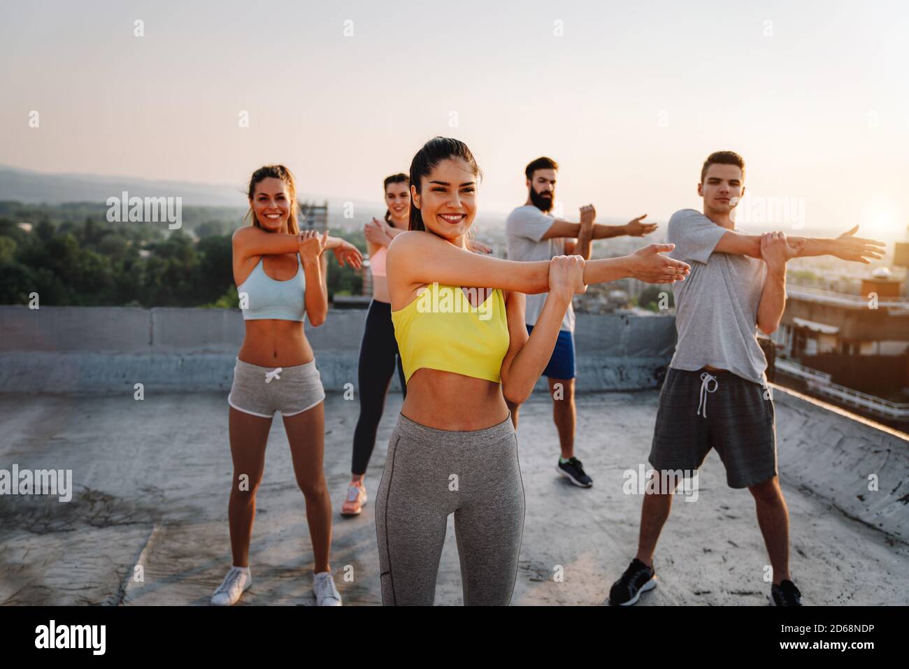 Fitness, sport, training and lifestyle concept. Group of fit people ...