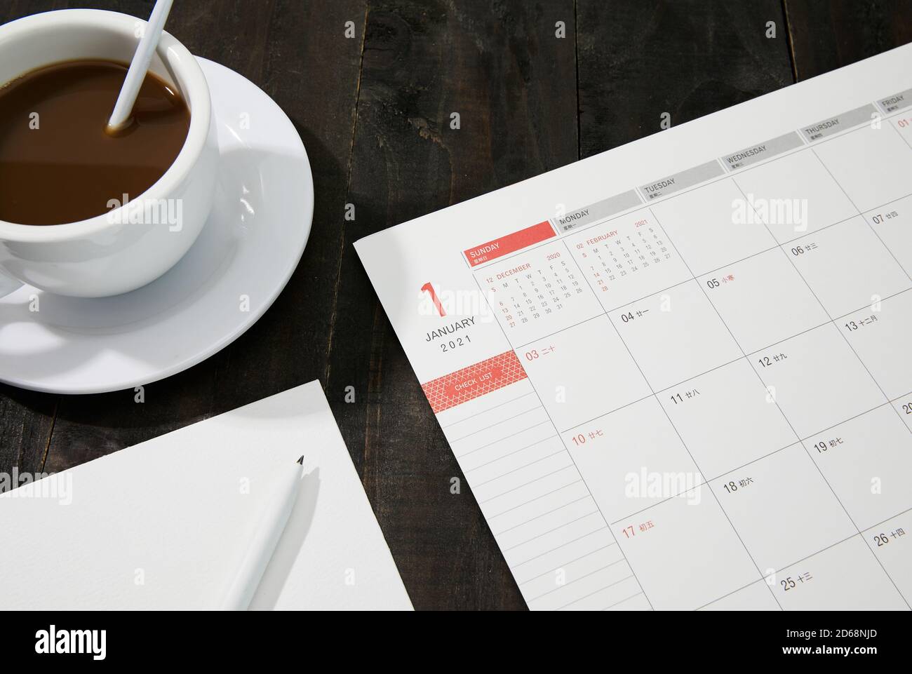 Cup of coffee and a calendar - the first day of the year Stock Photo ...