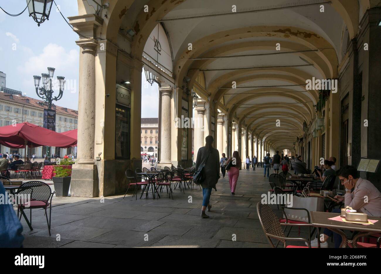 a portico of piazza san carlo frequented by tourists and citizens Stock ...