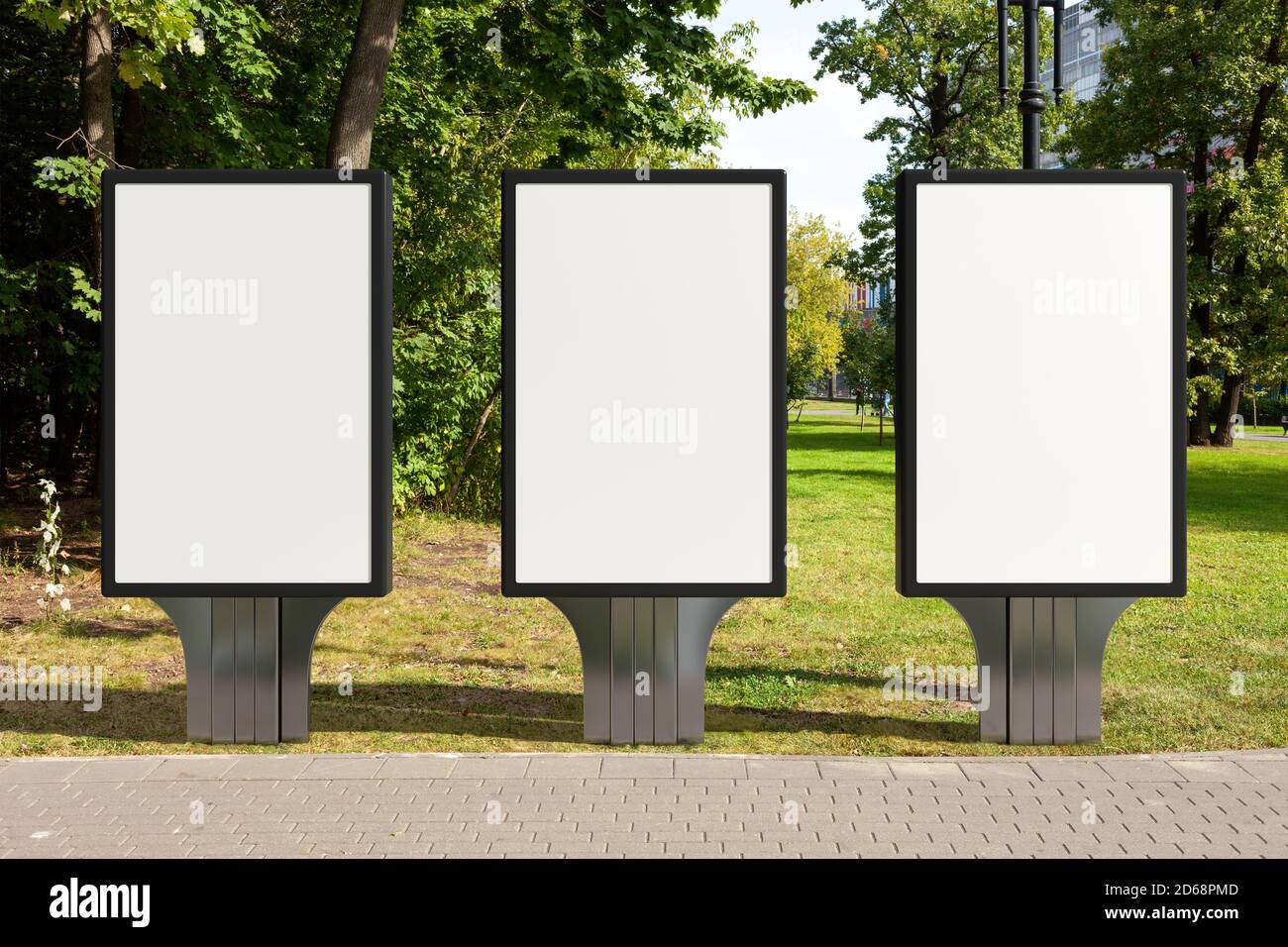 Advertising billboard stand mock up in the public city park Stock Photo ...