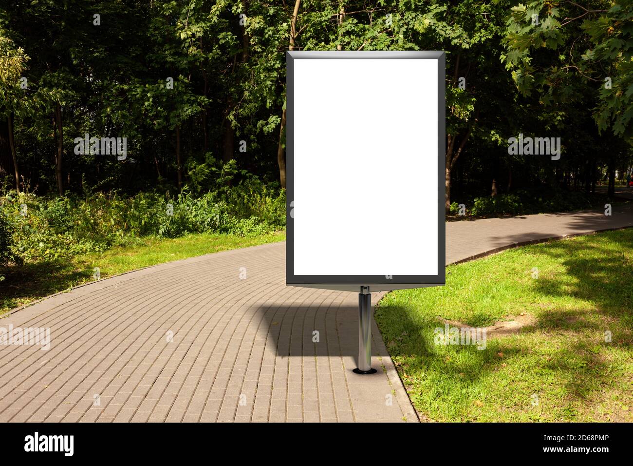 Advertising billboard stand mock up in the public city park Stock Photo ...