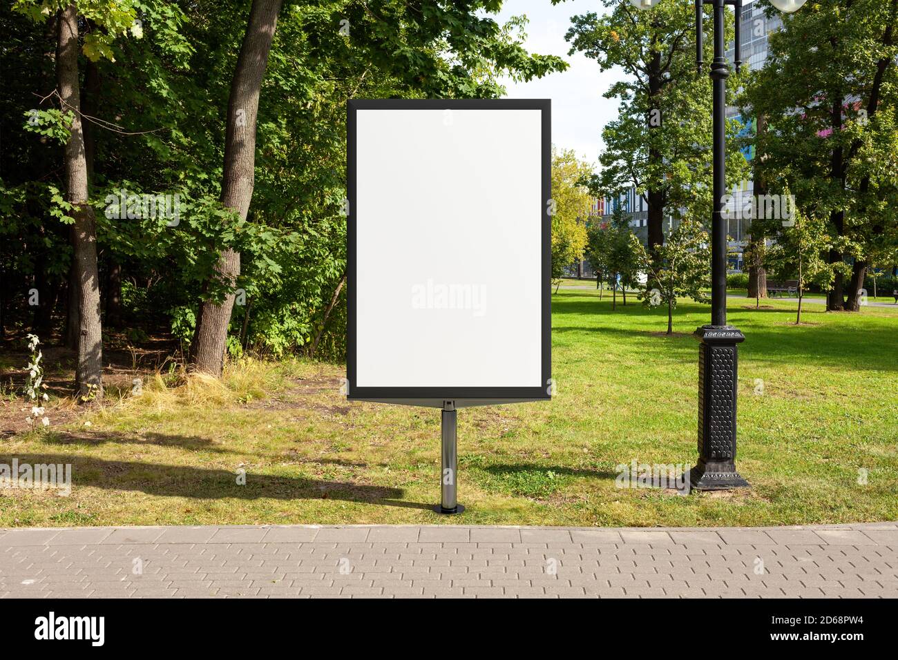 Advertising billboard stand mock up in the public city park Stock Photo ...