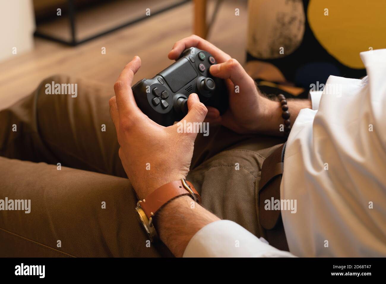 Video game console controller in gamer hands, close up. Side view Stock ...