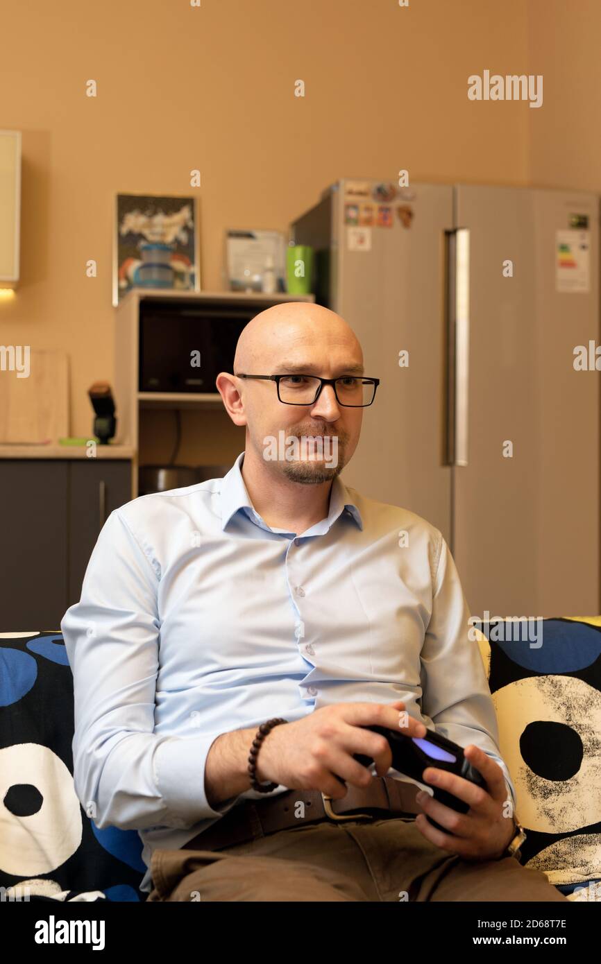 People playing playstation racing video hi-res stock photography and ...