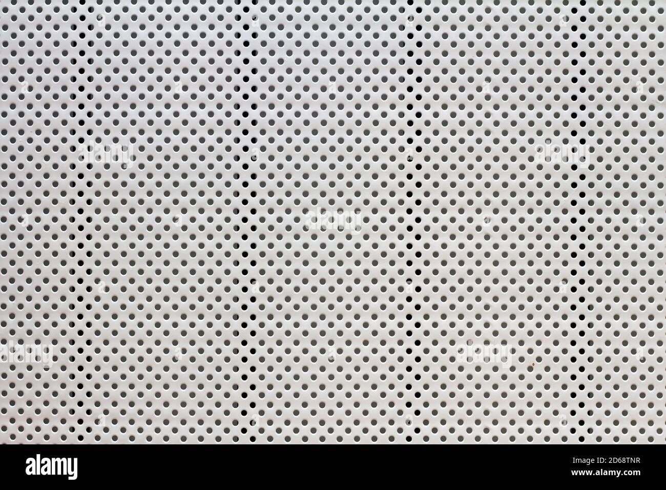 gray and black small polka dots pattern, abstract background with holes ...