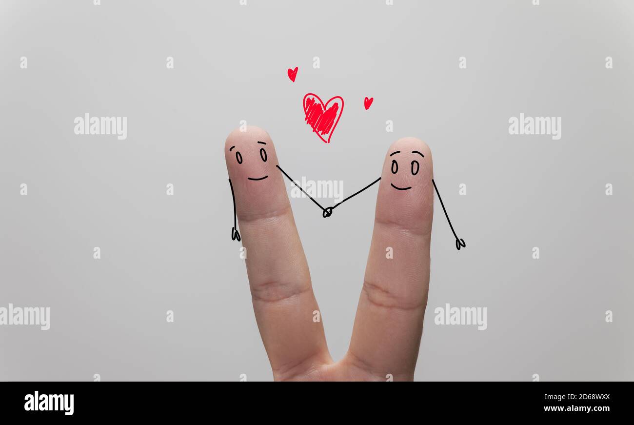 Finger couple in love, holding the hands of each other isolated on a ...