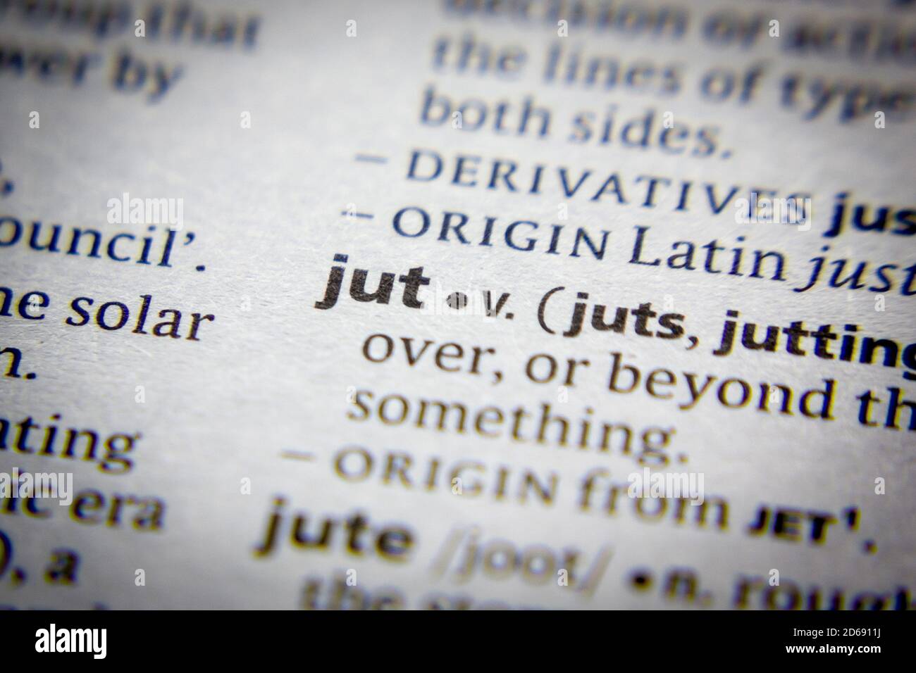 Word or phrase Jut in a dictionary Stock Photo - Alamy
