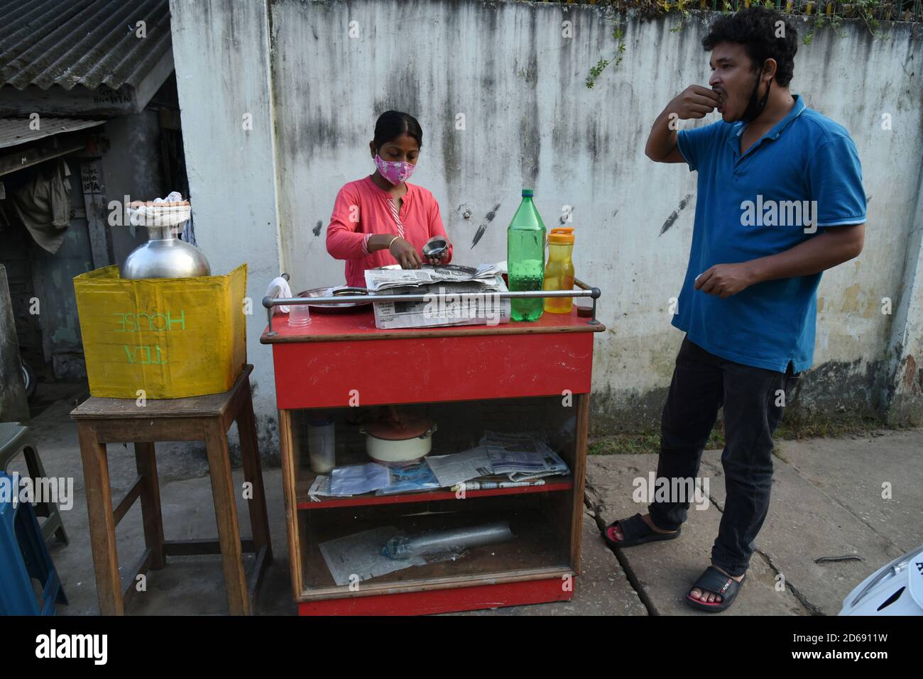 Guwahati, Assam, India. 14th Oct, 2020. An women prepare Tekeli pitha ...