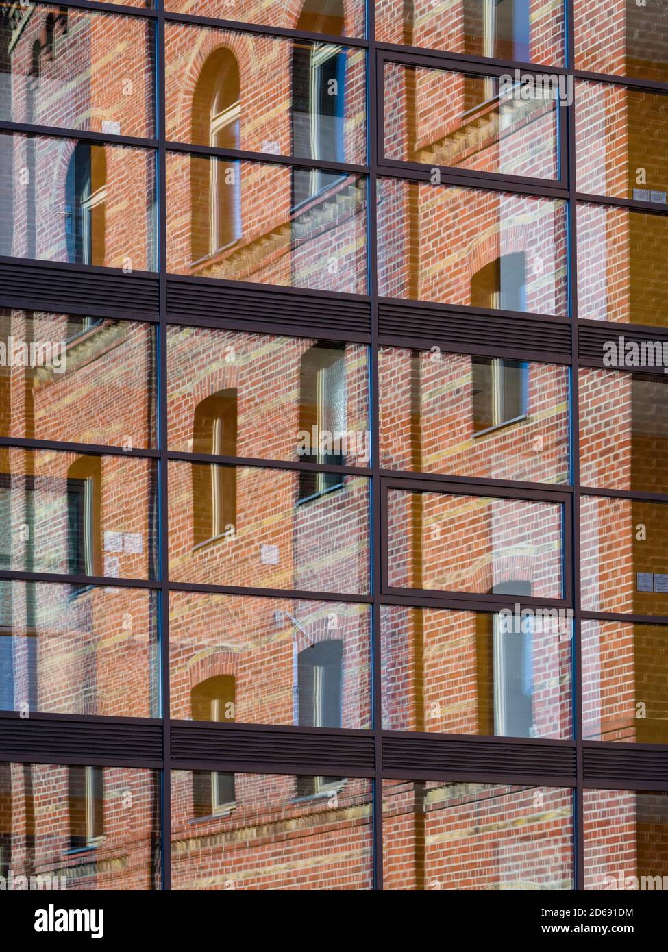 Brick architecture of a former prison in combination with a glass ...