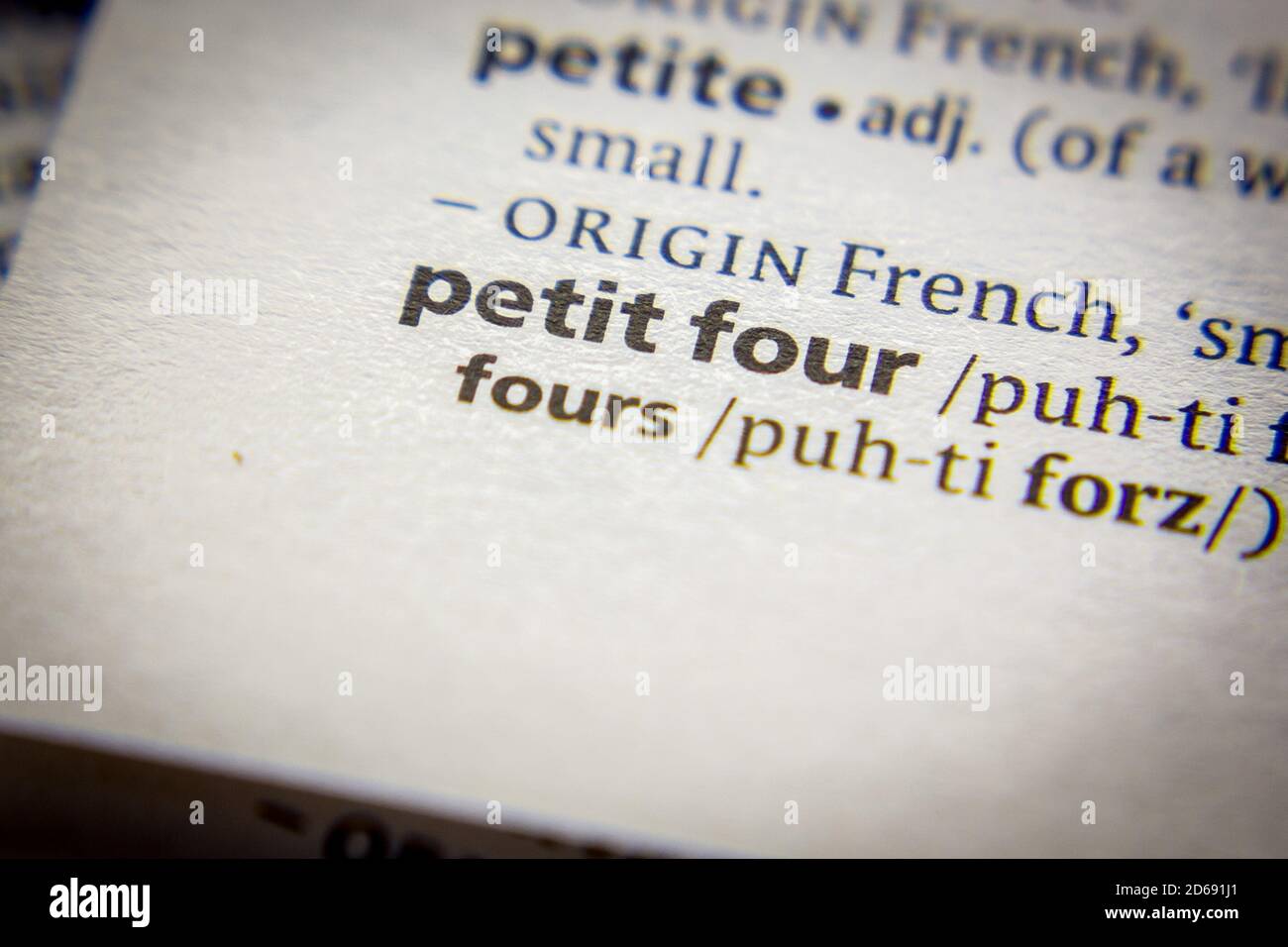 Word or phrase Petit four in a dictionary Stock Photo - Alamy