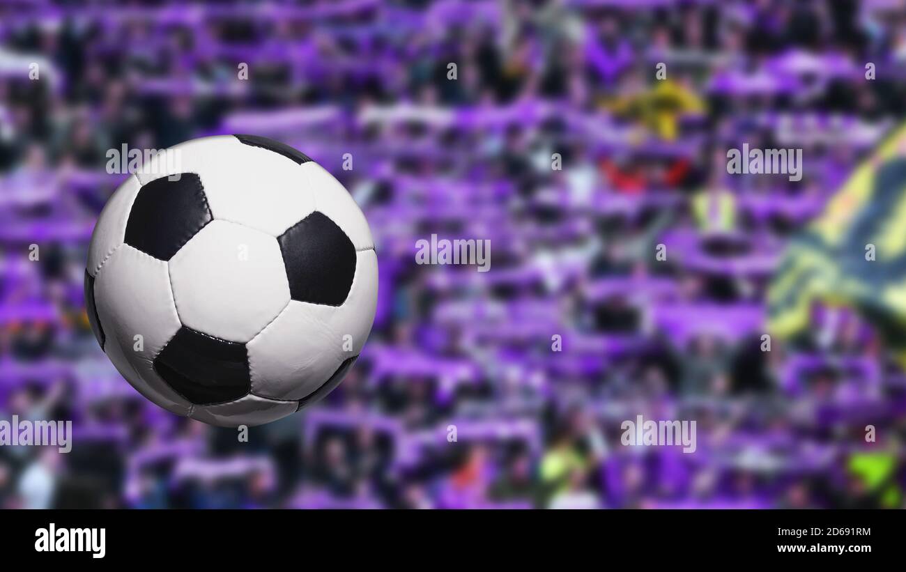 Soccer ball on a blurred background. Football fans. Close-up Stock ...