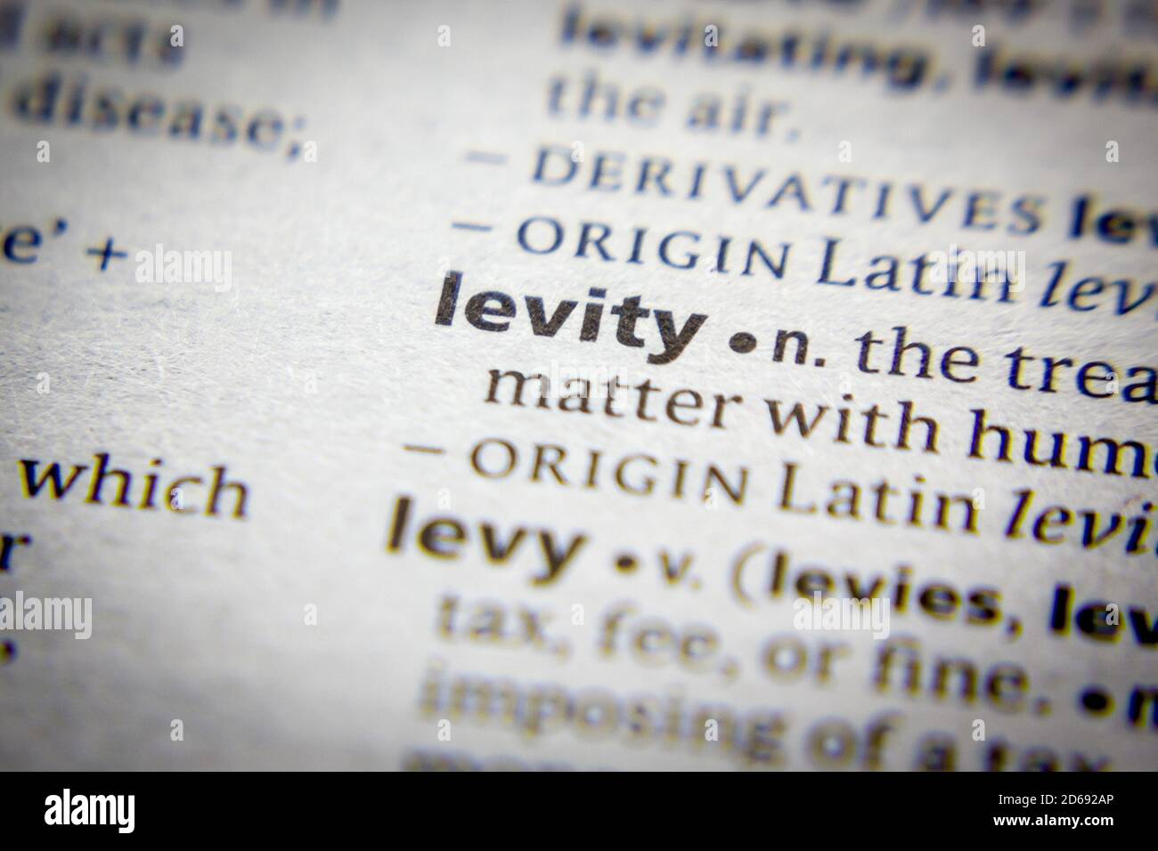 Word or phrase Levity in a dictionary Stock Photo - Alamy