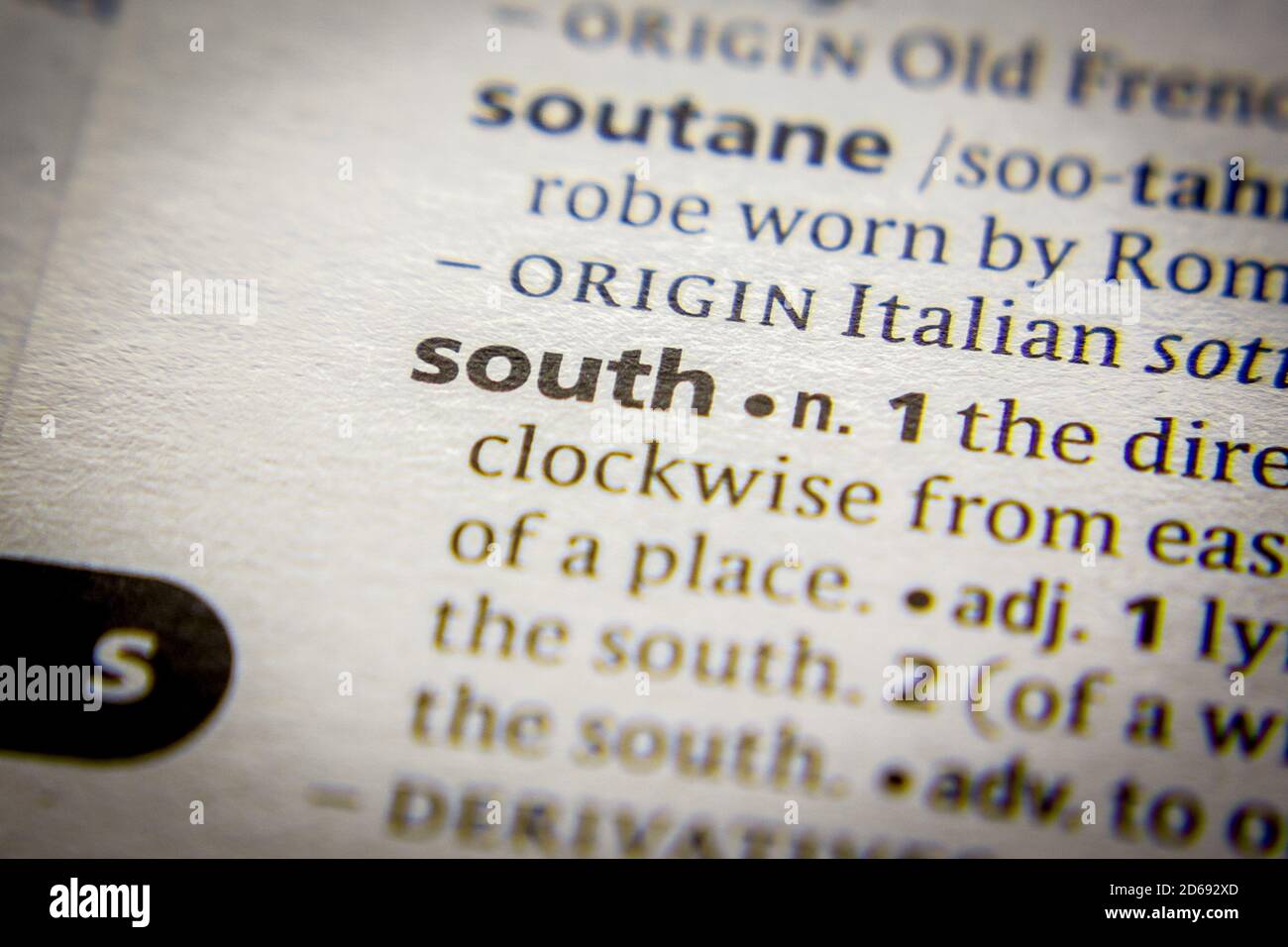 Word or phrase South in a dictionary Stock Photo - Alamy