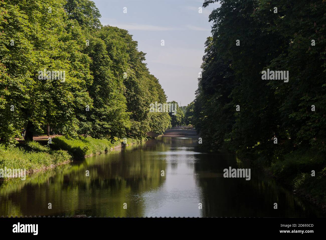 Beautiful park scene in public park with lawn trees water and ...