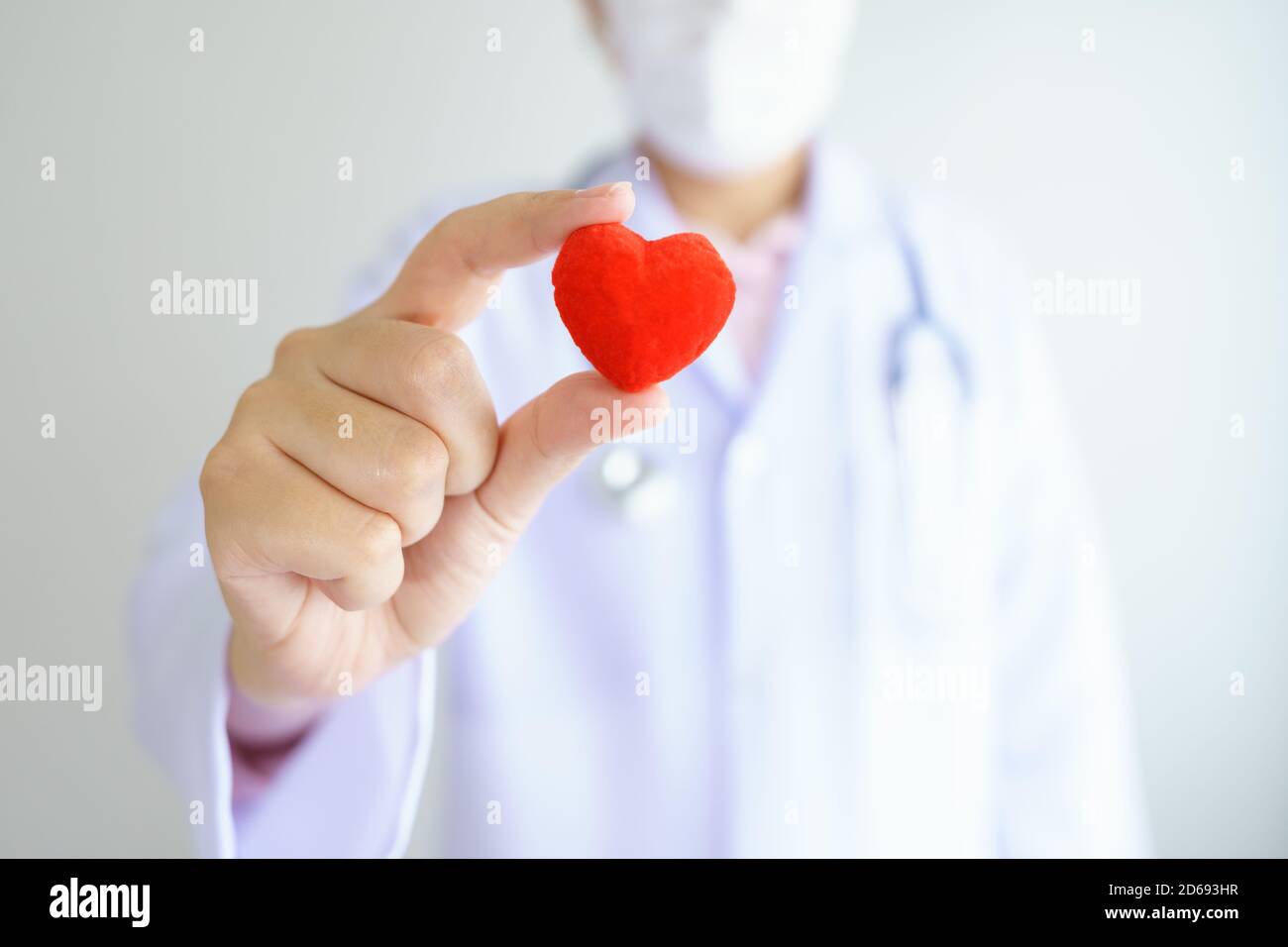 Heart check Doctor holding Red heart on hands at hospital office ...