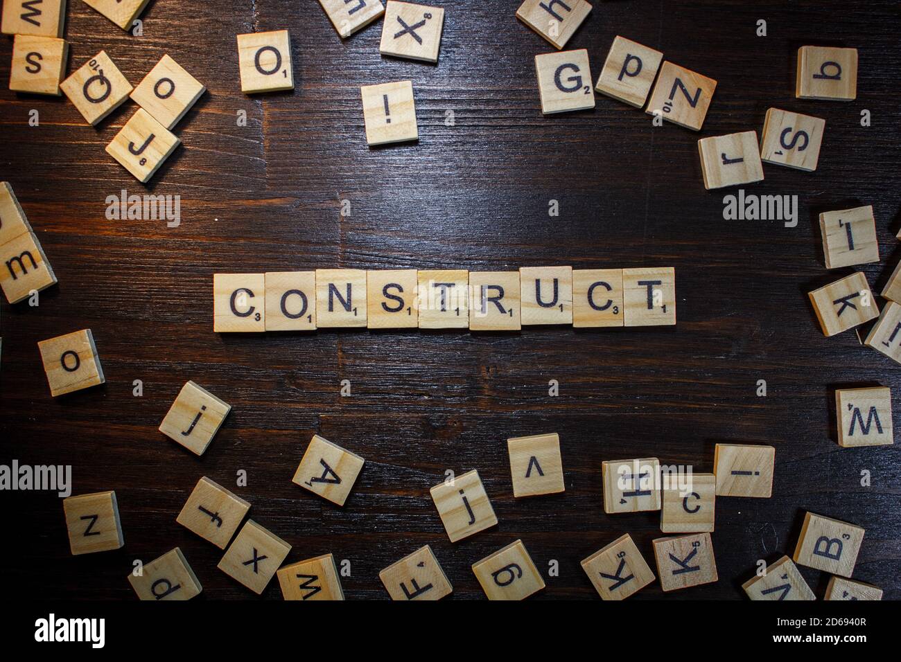 Word or phrase Construct made with scrabble letters on black table ...