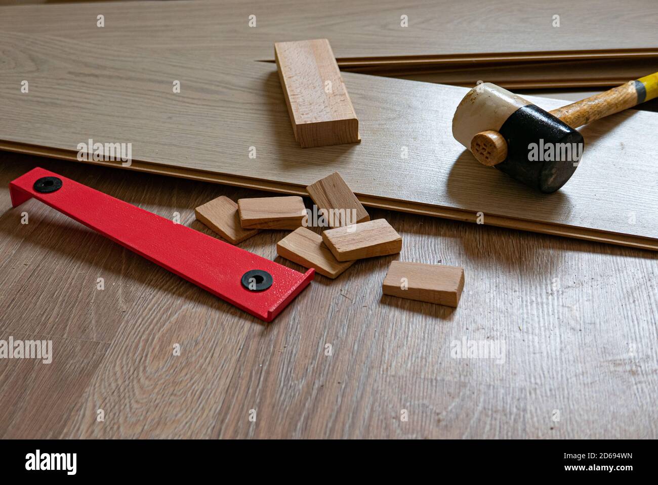 Equipment for a parquet floor mounting with laminate flooring Stock ...