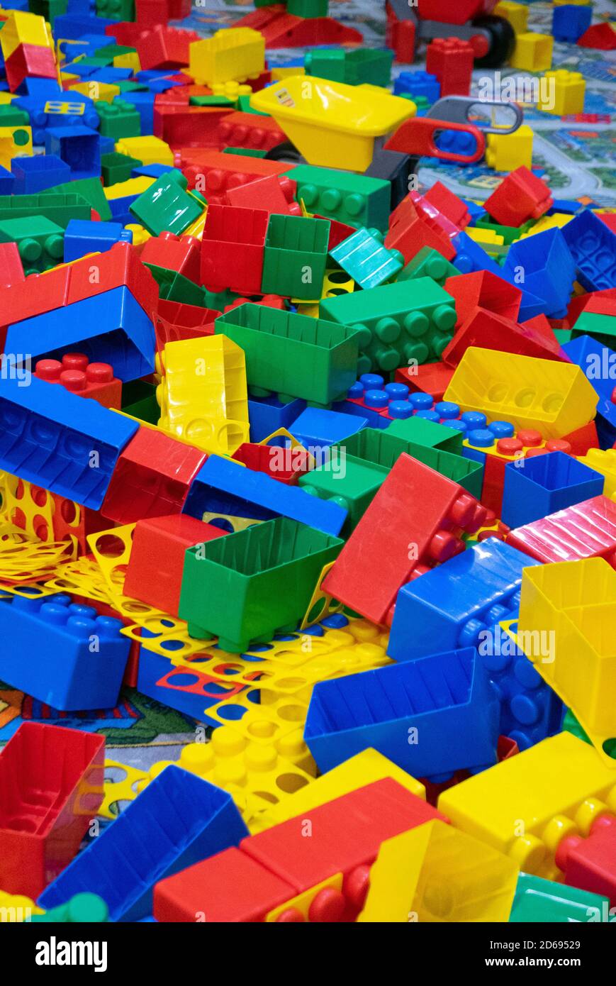 Big colored toy blocks in the game center Stock Photo - Alamy