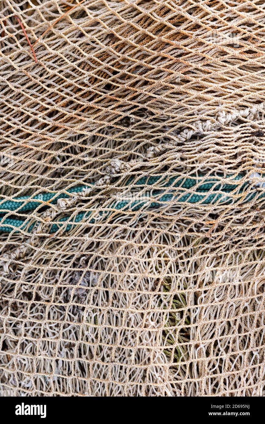 Elements of old fishing nets in the port Stock Photo - Alamy