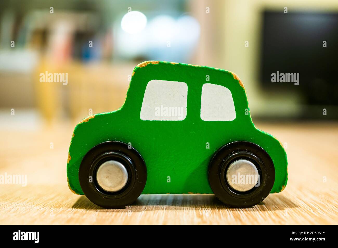 Closeup shot of a miniature green car toy Stock Photo - Alamy