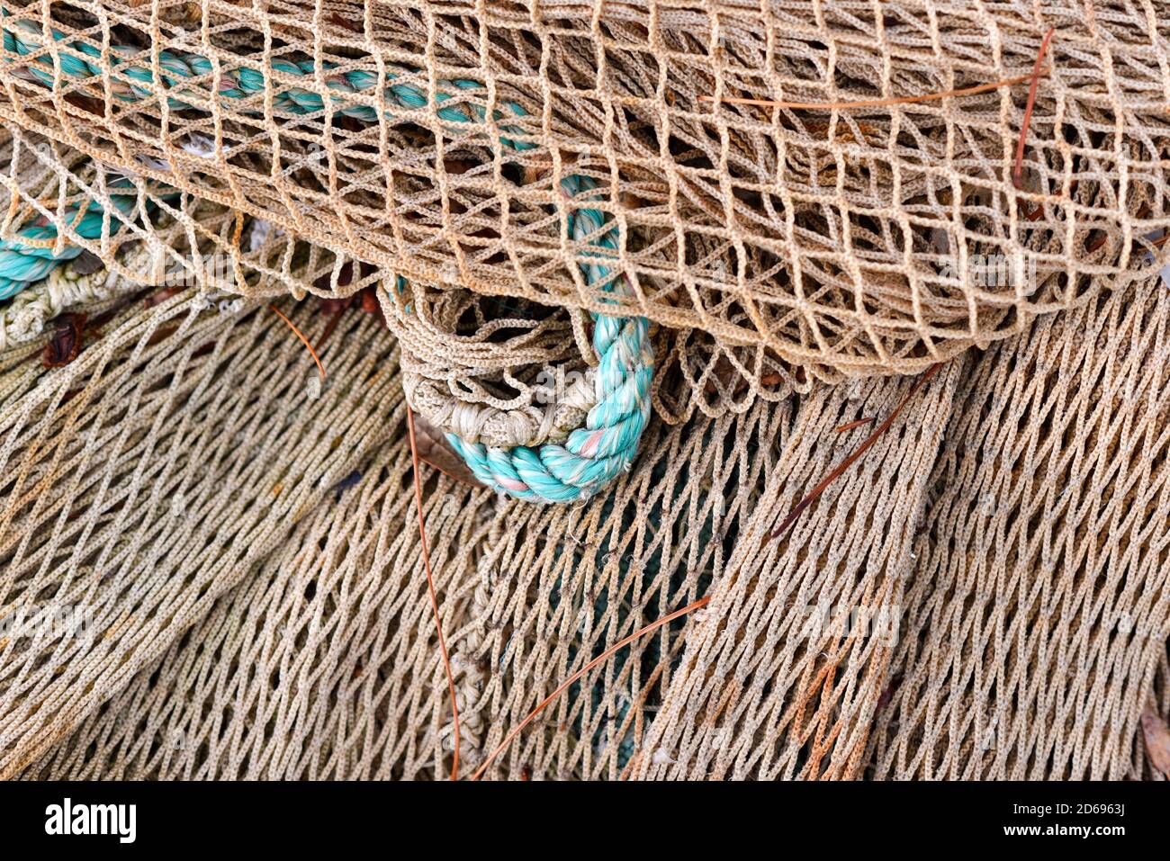 Elements of old fishing nets in the port Stock Photo - Alamy