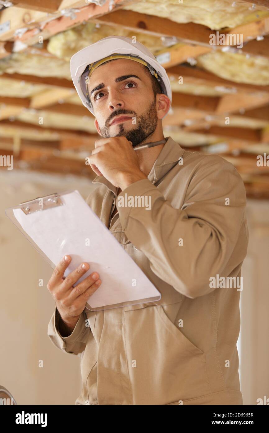 Employee thinking and taking notes hi-res stock photography and images ...