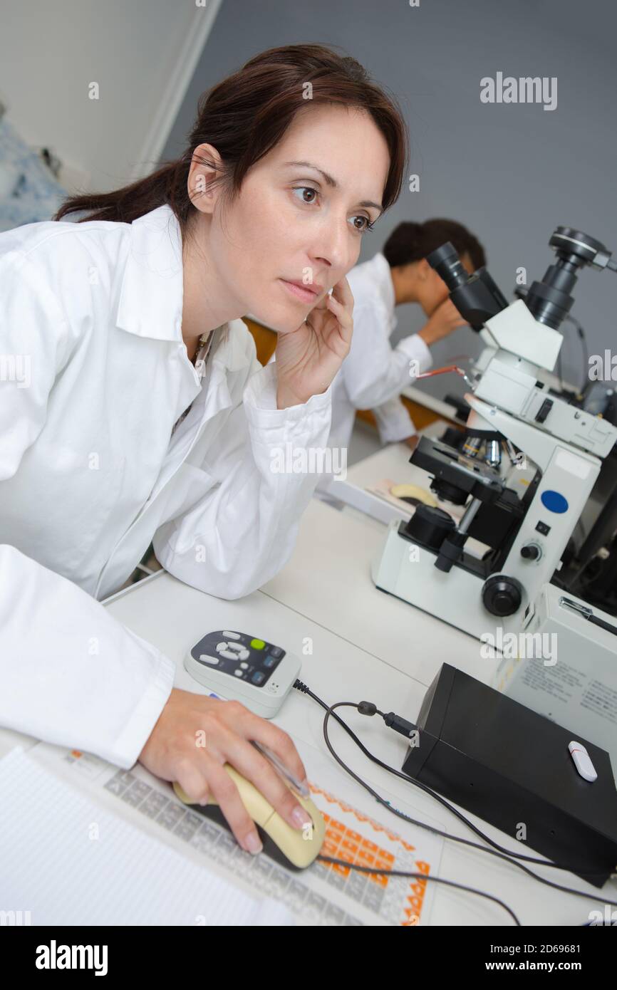 researcher analyzing liquid chromatography data Stock Photo - Alamy