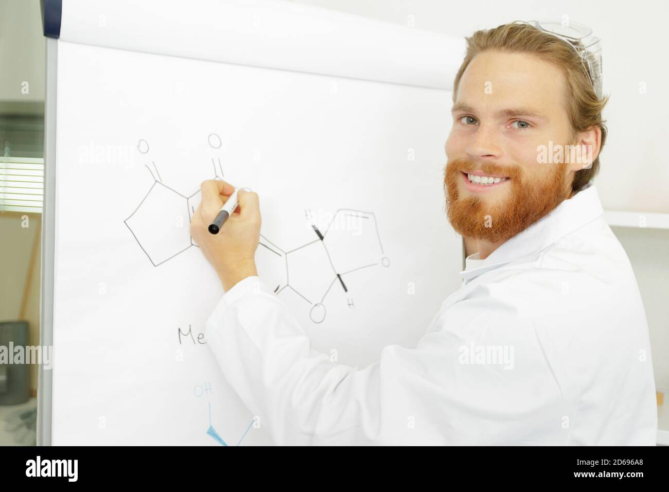 Man writing formula on board hi-res stock photography and images - Alamy