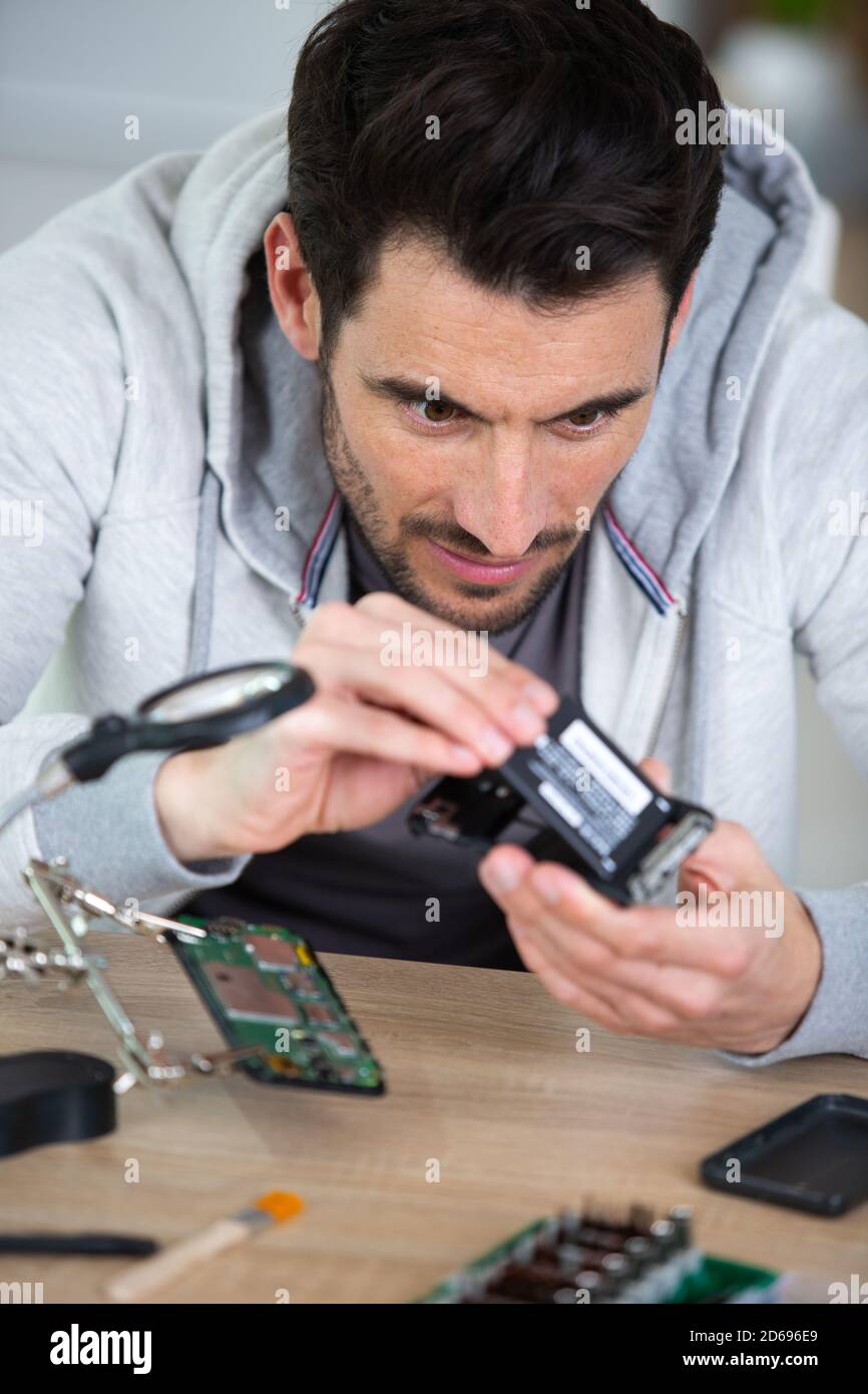 electrician working with electronical devices to the camera Stock Photo ...