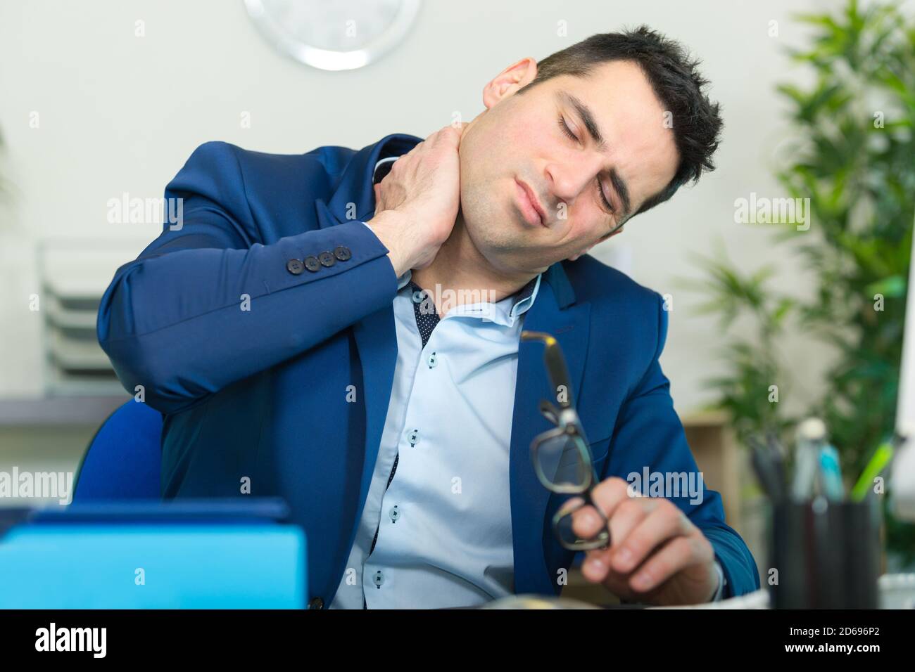 Neck pain work mature adult hi-res stock photography and images - Alamy