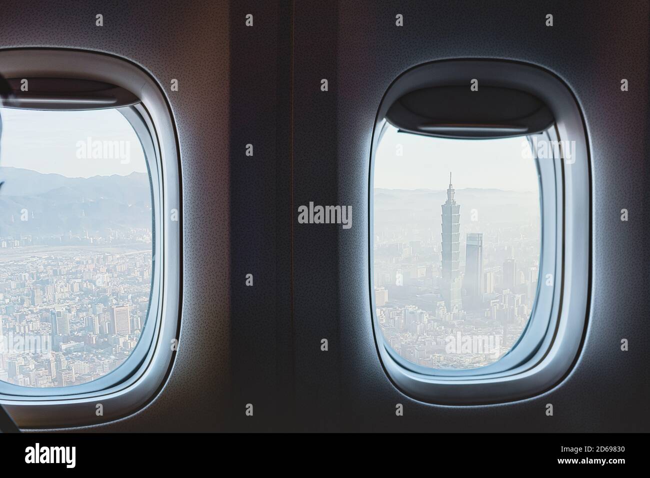 Airplane interior with window view of Taipei city, Taiwan. Concept of ...
