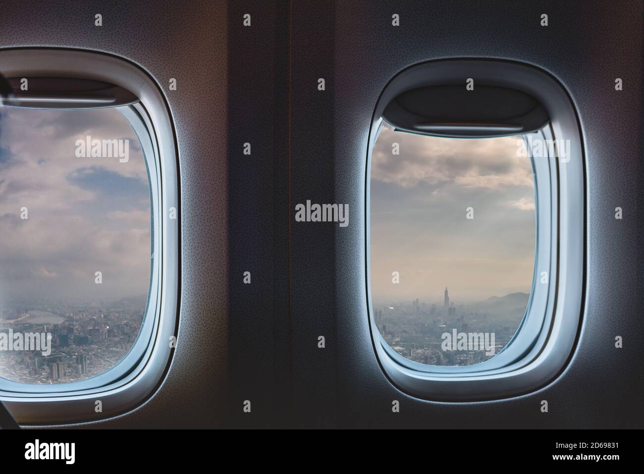 Airplane interior with window view of Taipei city, Taiwan. Concept of ...