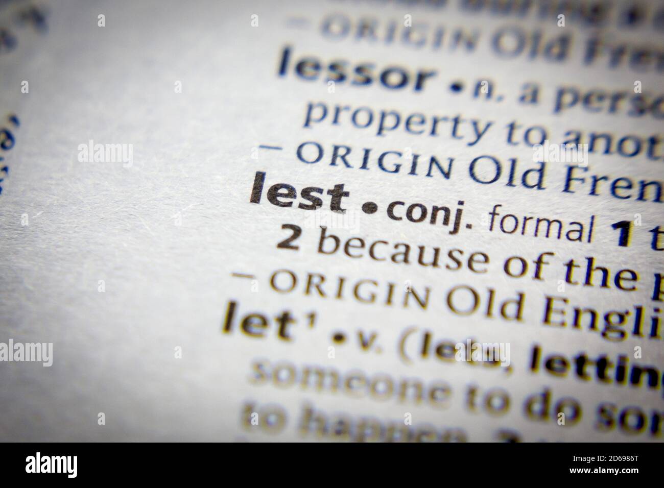 Word or phrase Lest in a dictionary Stock Photo - Alamy