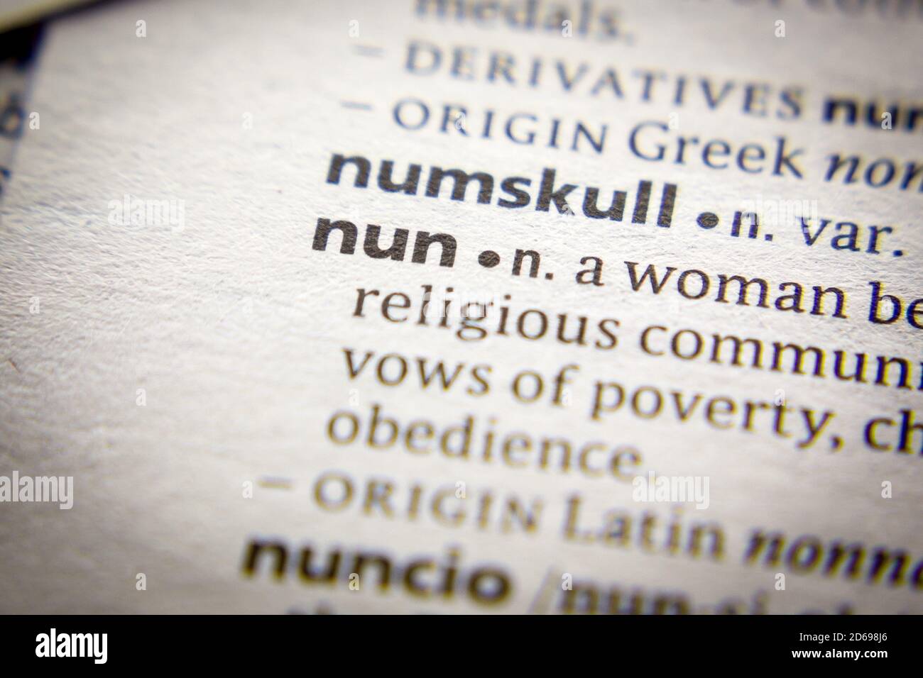 Word or phrase Nun in a dictionary Stock Photo - Alamy