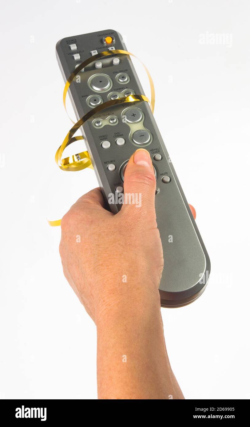 hand holding a remote control on white background, close-up Stock Photo ...