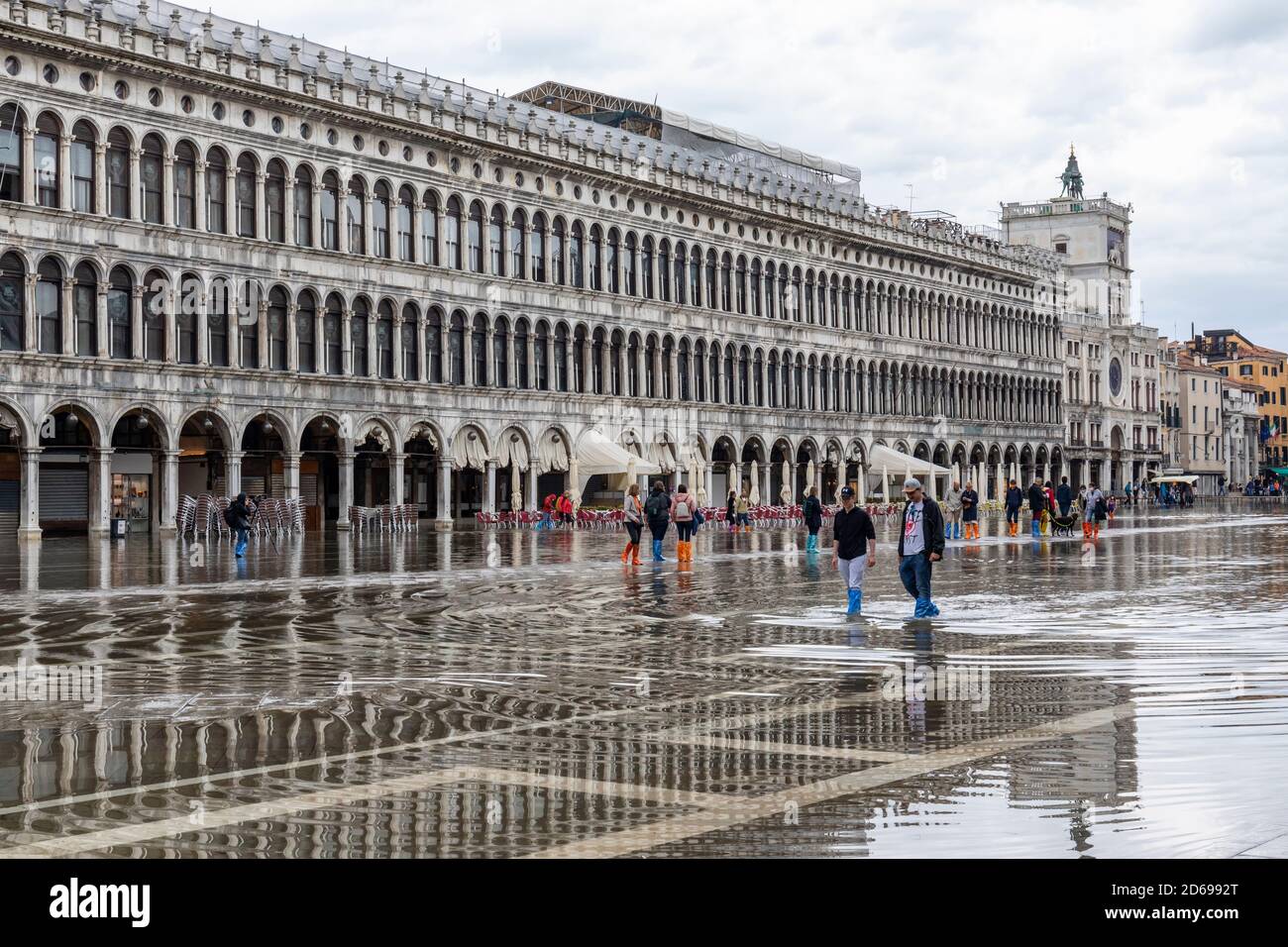 High water - Acqua Alta causing flooding in Piazza San Marco - tourists ...