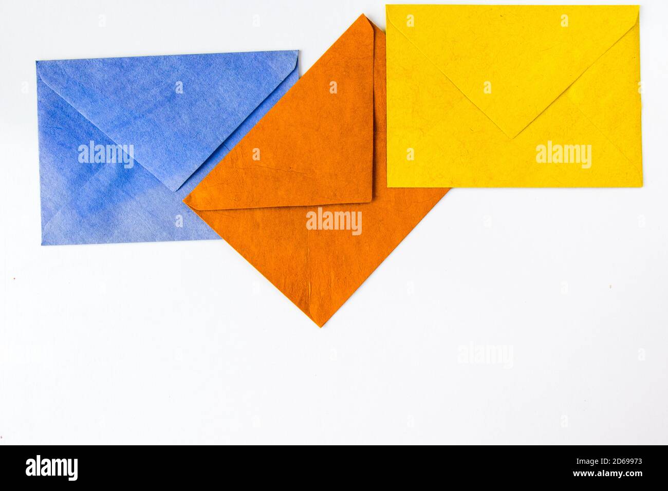 Three envelope on the white background Stock Photo - Alamy