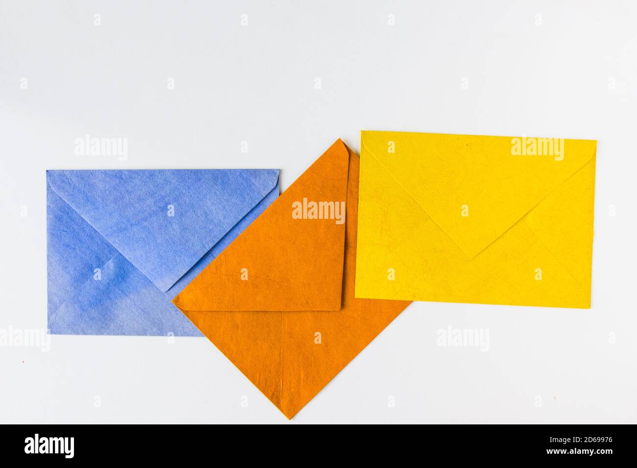 Three envelope on the white background Stock Photo - Alamy