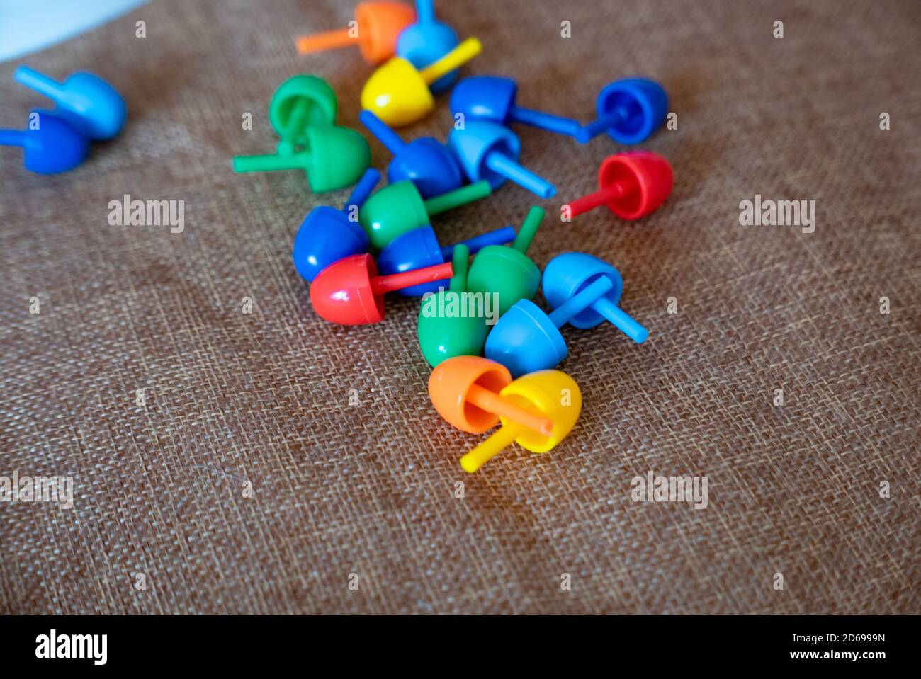 colorful mosaic pins for puzzle game on the table Stock Photo - Alamy
