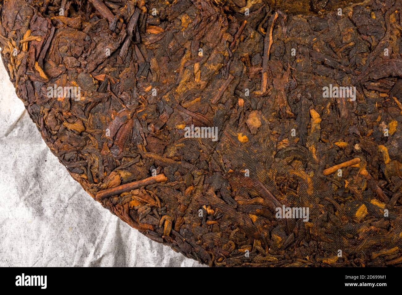 Chinese pressed PU-erh tea on wrapping paper, close-up, macro Stock ...