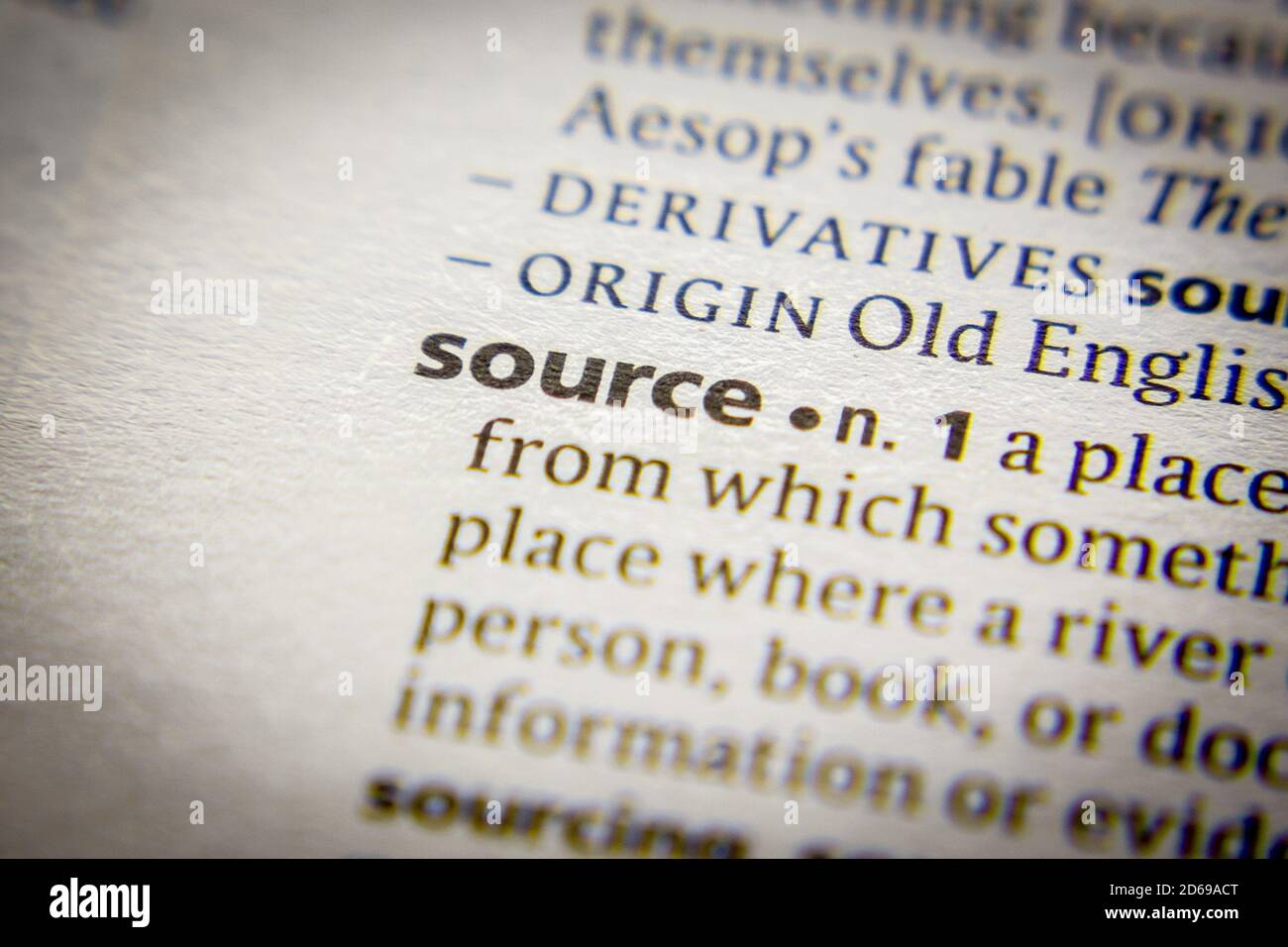 Word or phrase Source in a dictionary Stock Photo - Alamy