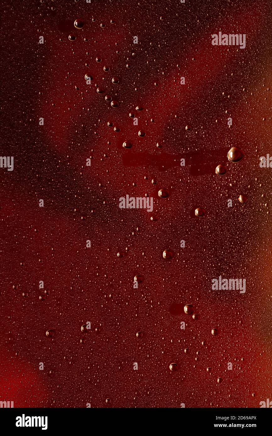 Close up view of cold drops on the glass of beer background. Texture of ...