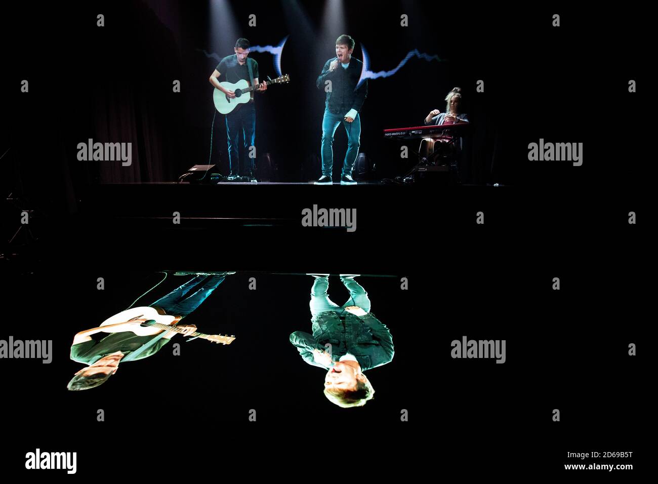 Singer songwriter Dan Olsen performs as an interactive hologram ...