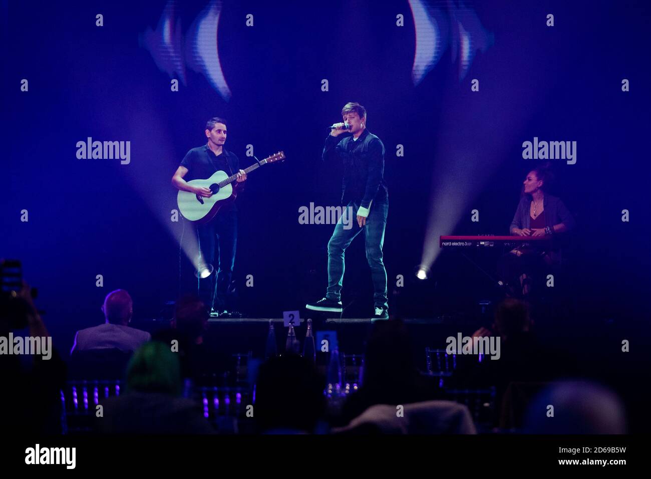 Singer songwriter Dan Olsen performs as an interactive hologram ...