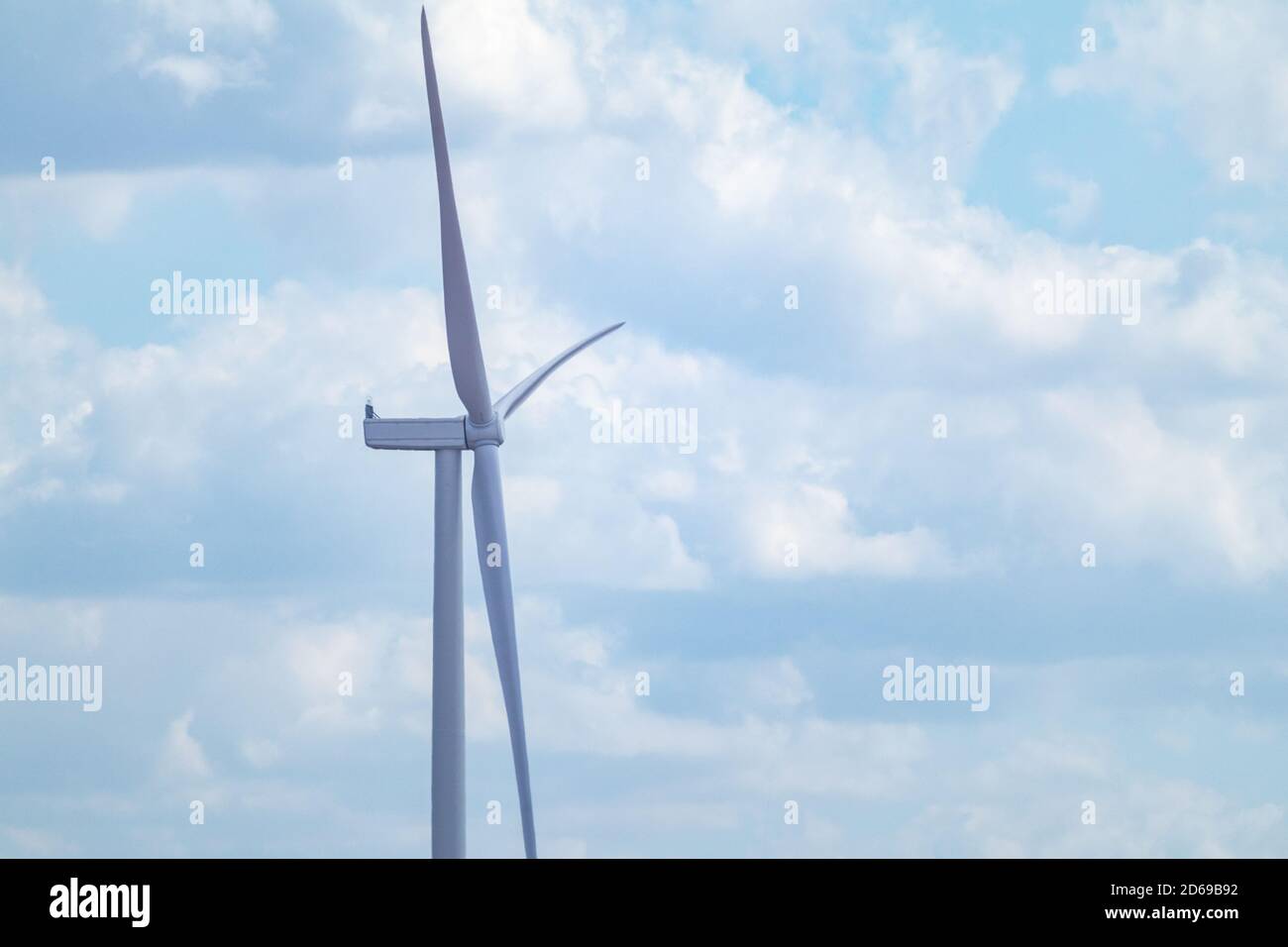 Wind generator propeller close-up on farm sustainable industry. Cloudy ...