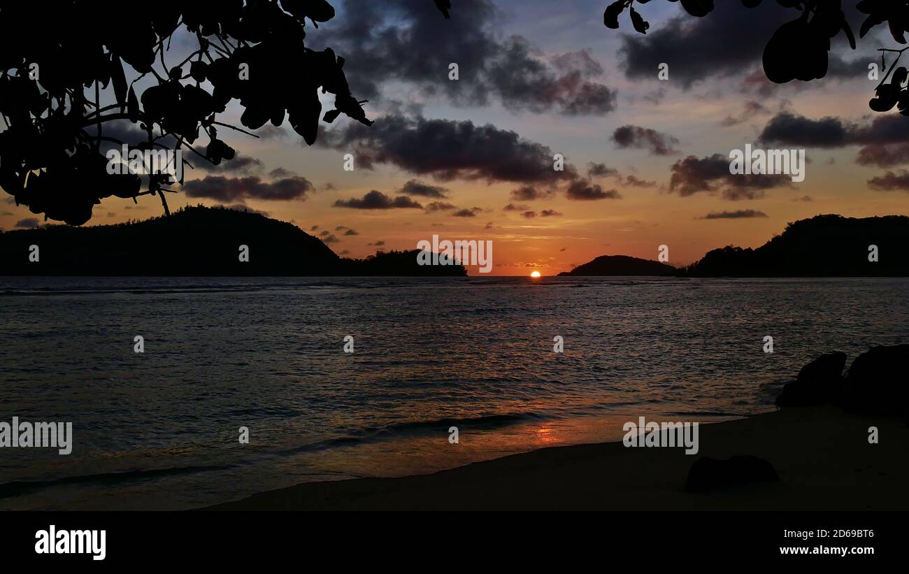 Majestic sunset on tropical beach on Mahe island, Seychelles (Port ...